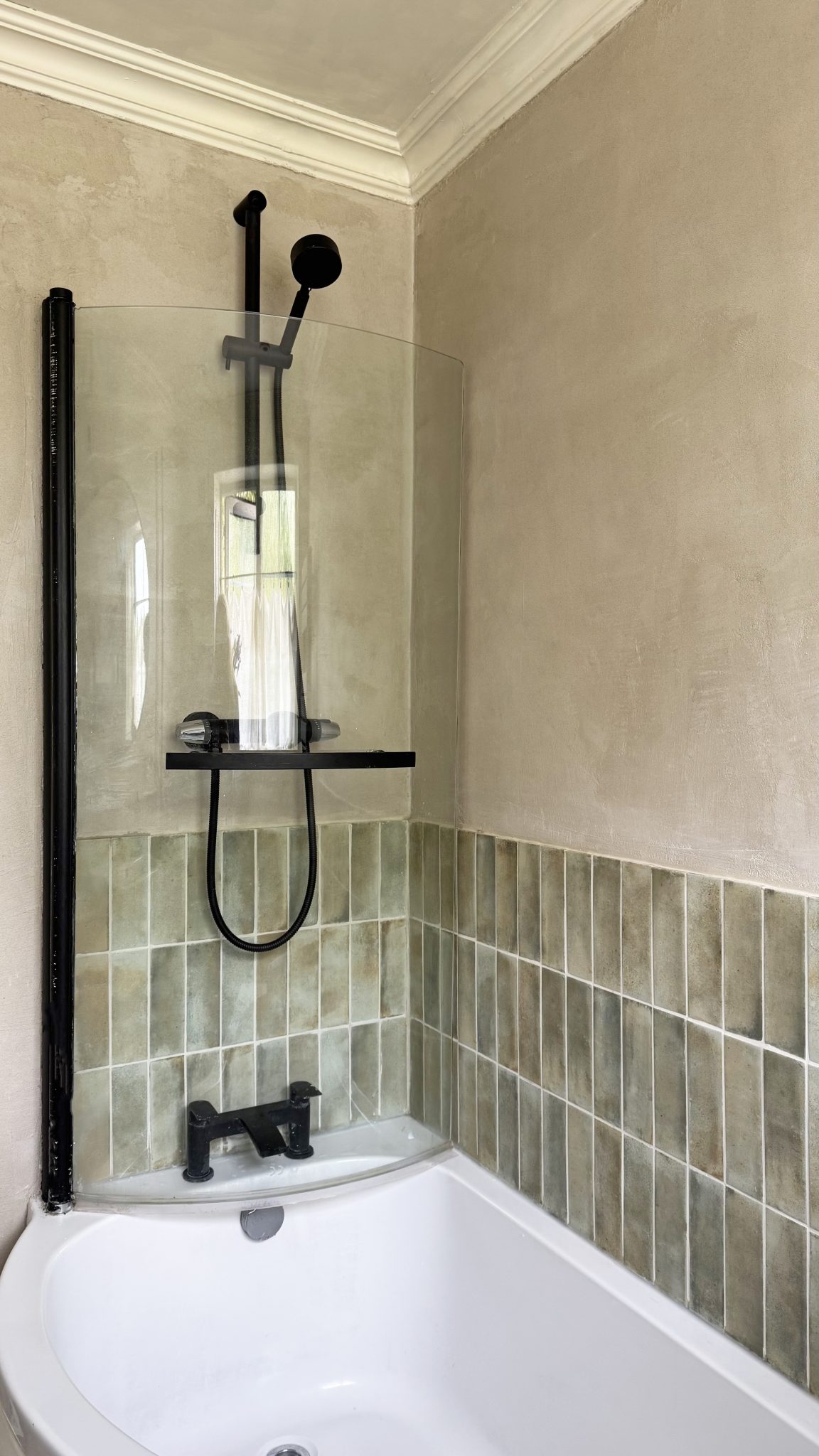 How to microcement over tiles & transform a tired bathroom - Claire ...