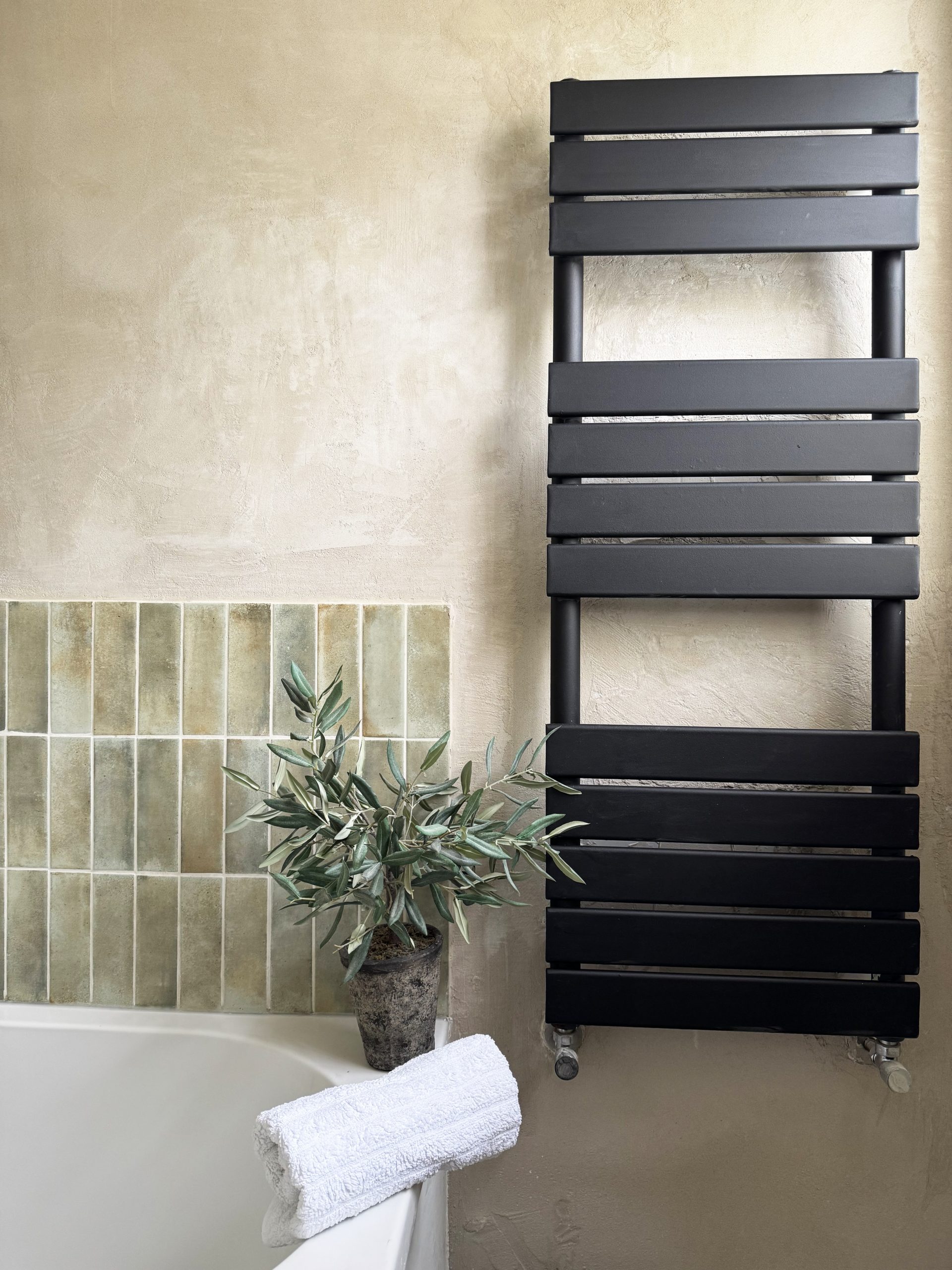 How to microcement over tiles & transform a tired bathroom - Claire ...